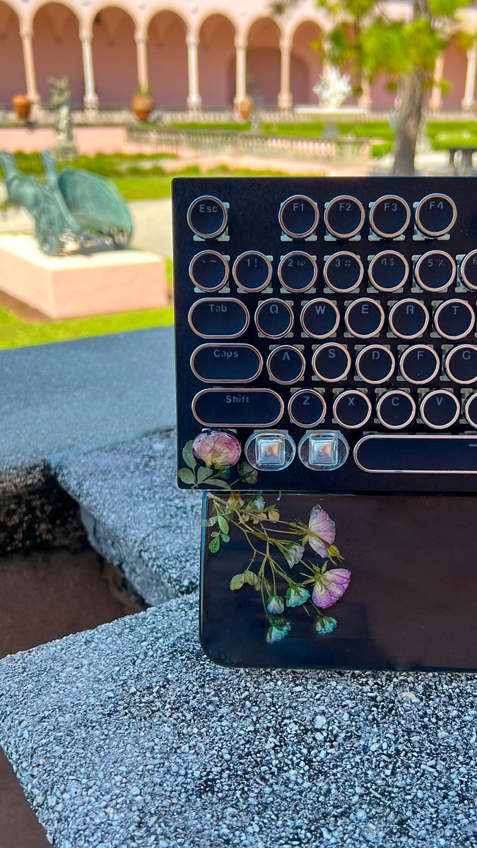 Pink and Blue Flower Black background Typewriter Style Keyboard and wr ...